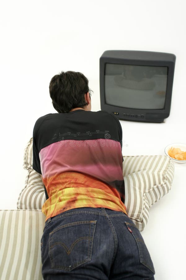 Watching tv stock photo. Image of young, looking, boring - 260754