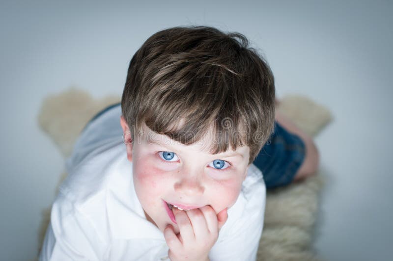 Watching TV or computer stock photo. Image of floor, blue - 30787872