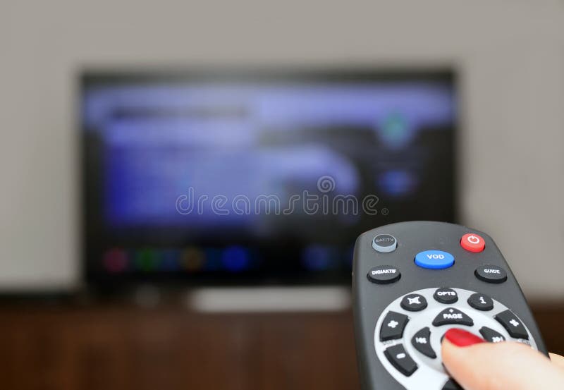 Watching TV and Using Remote Controller Stock Photo - Image of control ...