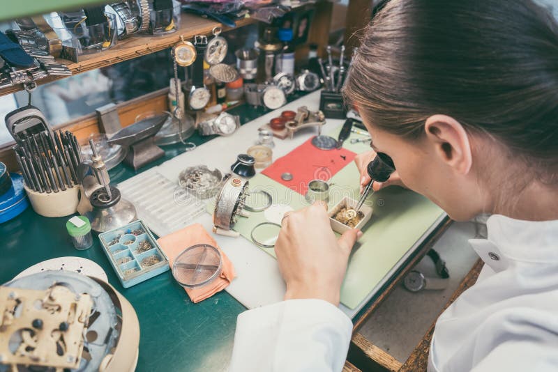 Watchmaker Absorbed in Her Delicate Work Stock Image - Image of gear ...