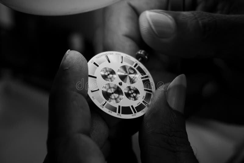 Watchmaker Examining the Dial and Crown of a Watch Stock Photo - Image ...