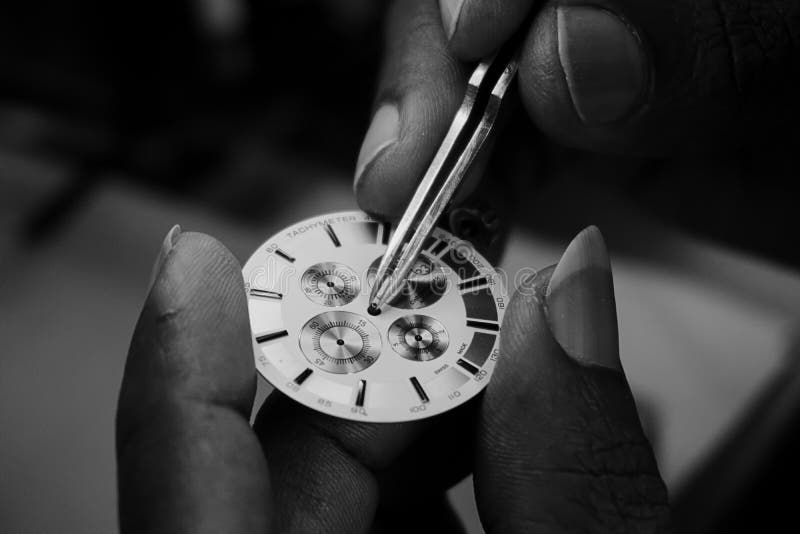 Watchmaker Examining the Dial of a Watch Stock Image - Image of hand ...