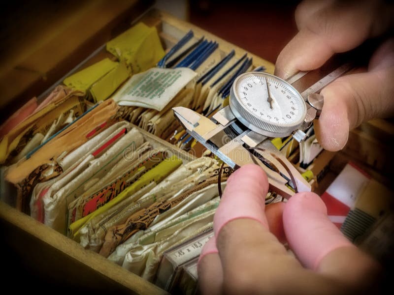 Watchmaker Measures a Winding Spring of Clock with the Caliber Stock ...