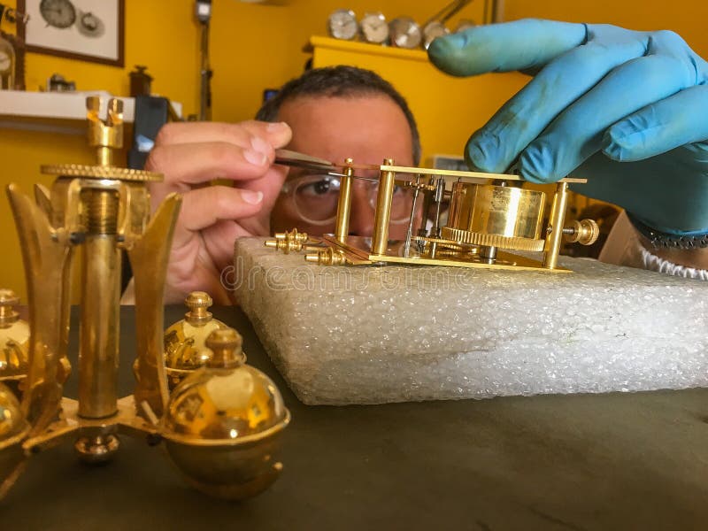Clockmaker Repairs Clocks and Watches in His Laboratory Stock Photo ...