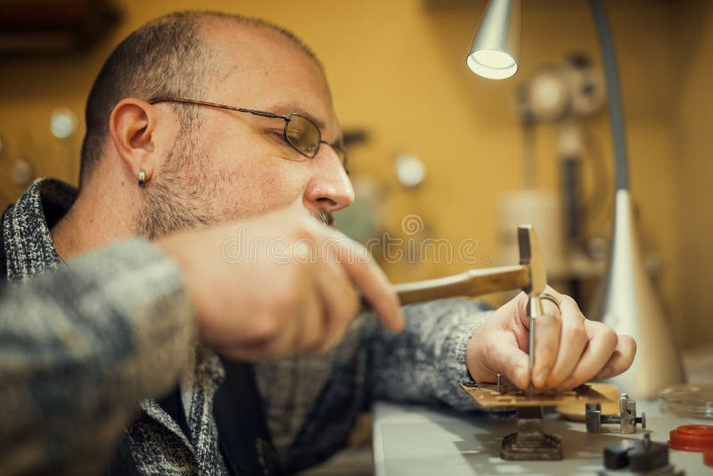 Watchmaker at work stock photo. Image of vehicle, watchmaking - 73190856