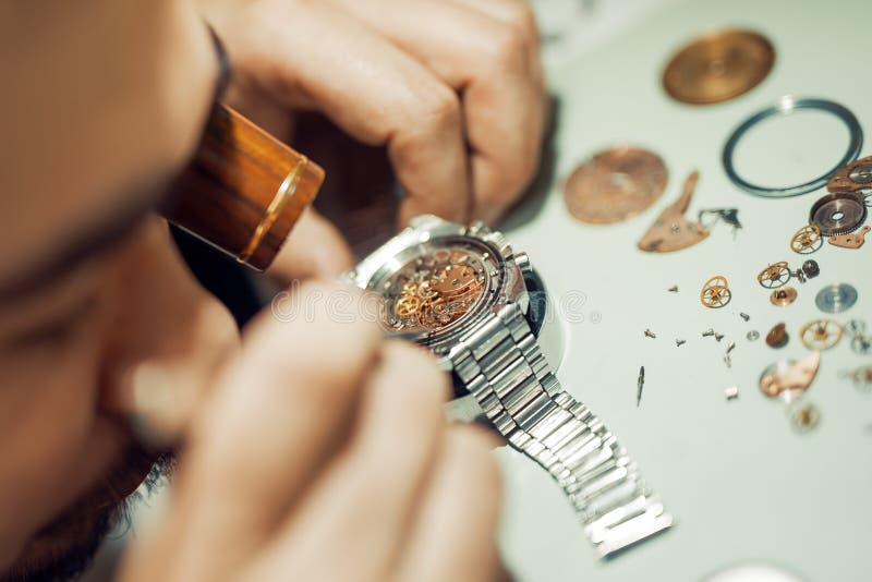 Watchmaker at work stock image. Image of watch, working - 74920805