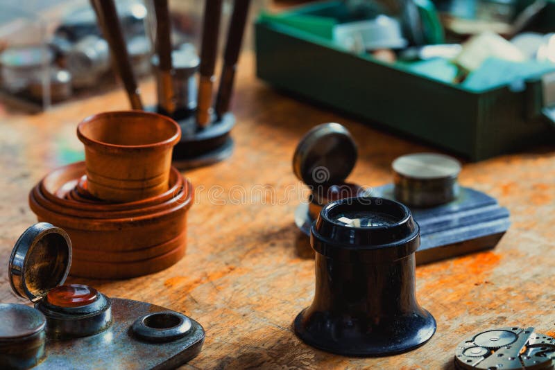 Watchmakers Tools and a Jewellers Loupe on a Workbench Stock Photo ...