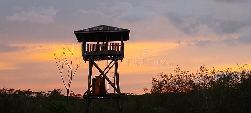 Watchtower at sunset stock image. Image of wind, lighting - 370719187