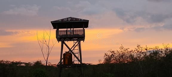 Watchtower at sunset stock image. Image of wind, lighting - 370719187