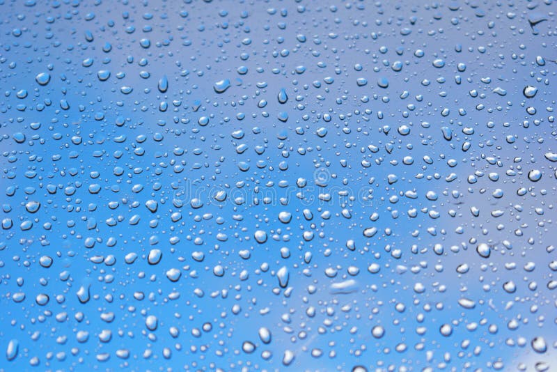 Large raindrops on glass stock image. Image of glass - 160047995