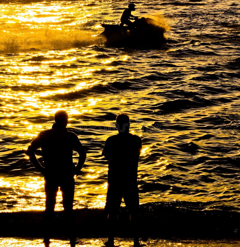Water Activity in the Sunset Stock Image - Image of fishing, lifestyle ...