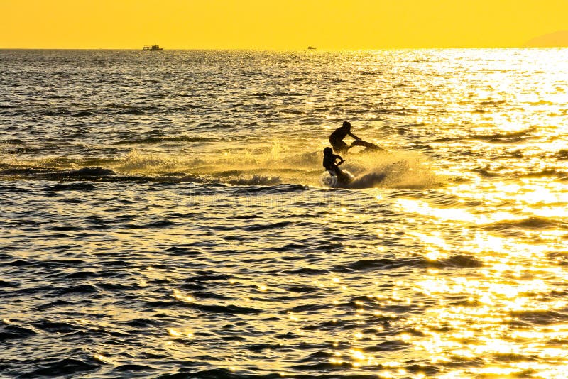 Water Activity in the Sunset Stock Image - Image of ocean, silence ...