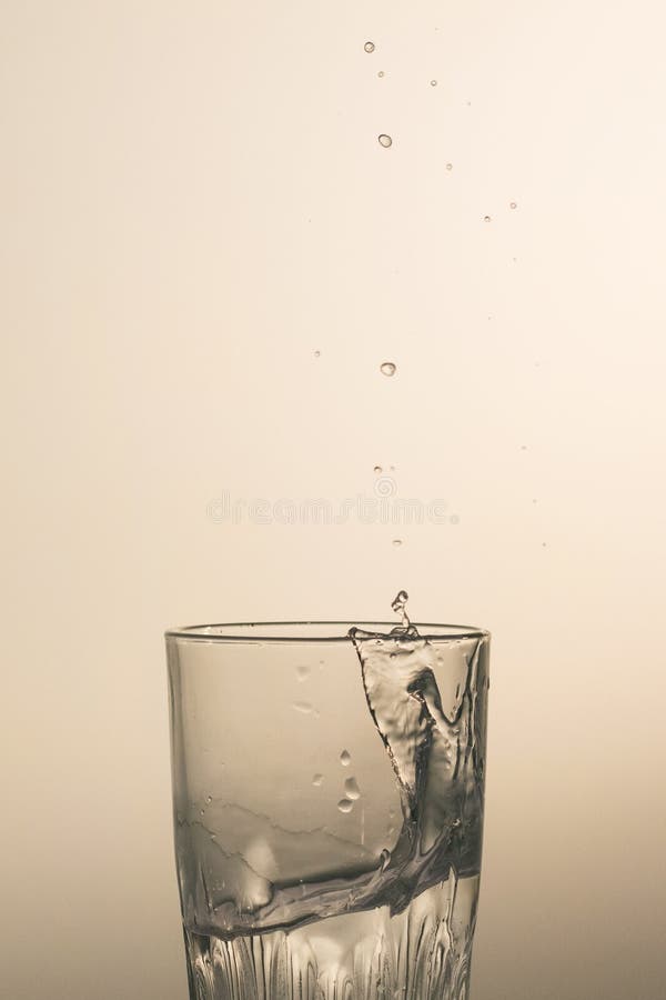 Water or Alcoholic Drink in a Glass, Splashing, Splash Closeup Stock ...