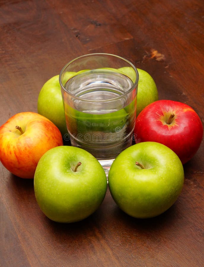 Water and apples stock image. Image of sweet, fruit, table - 44262921