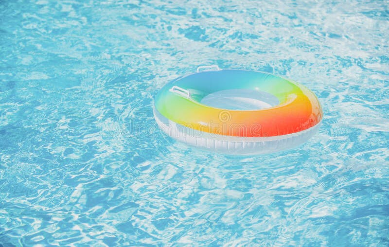Water Background. Pool Float, Ring Floating in a Refreshing Blue ...