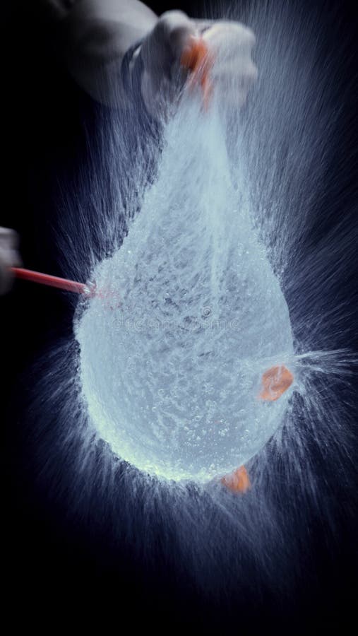 Water Balloon Exploding or Splashing Stock Photo - Image of green ...