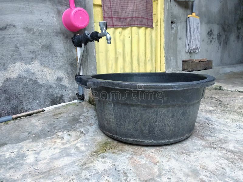 A Water Basin for Washing Activities Located Behind the House Stock ...
