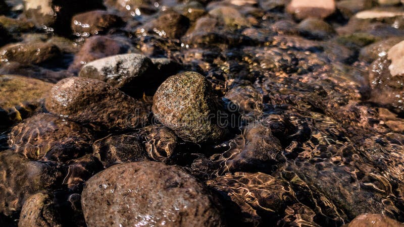 Water behind stones stock image. Image of rivers, lake - 227028829