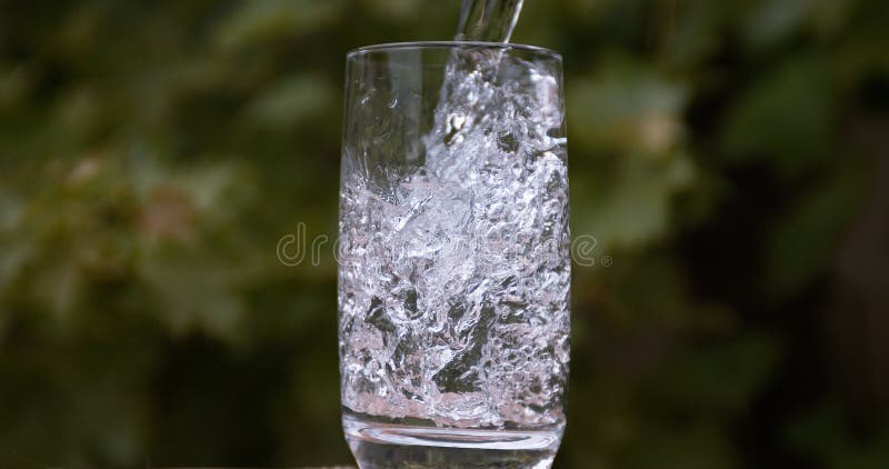 Water Being Poured into Glass Stock Photo - Image of model, pouring ...