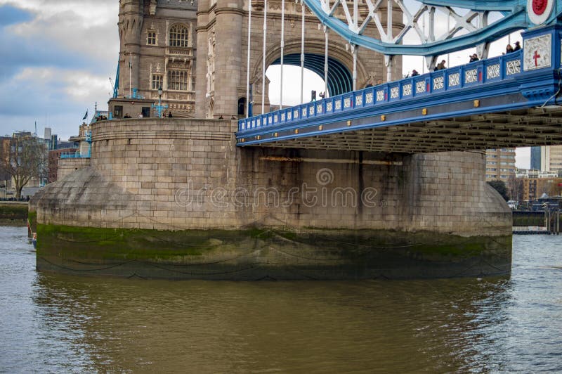 Water Below the Tower Bridge in London and Traffic Above Stock Photo ...