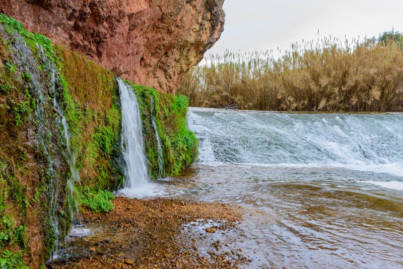 Water birth in the rock stock image. Image of stone, green - 65292845
