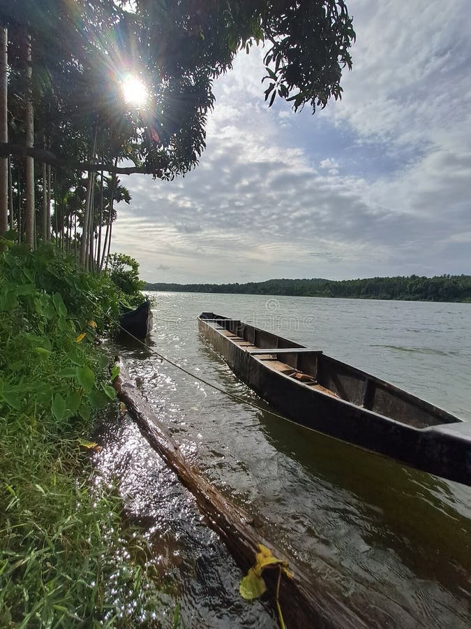 Water Boat River Sky Sun through the Tree Stock Image - Image of boat ...