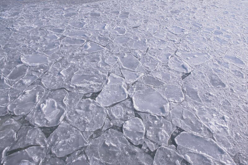 Ice Cracking on a Frozen River Stock Photo - Image of river, winter ...
