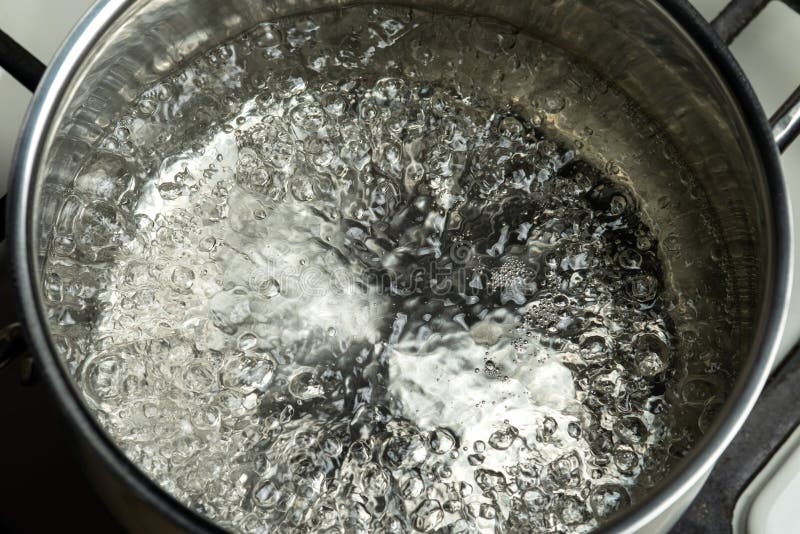 Water Boils in a Saucepan. Cooking. Place for Your Text Stock Photo ...
