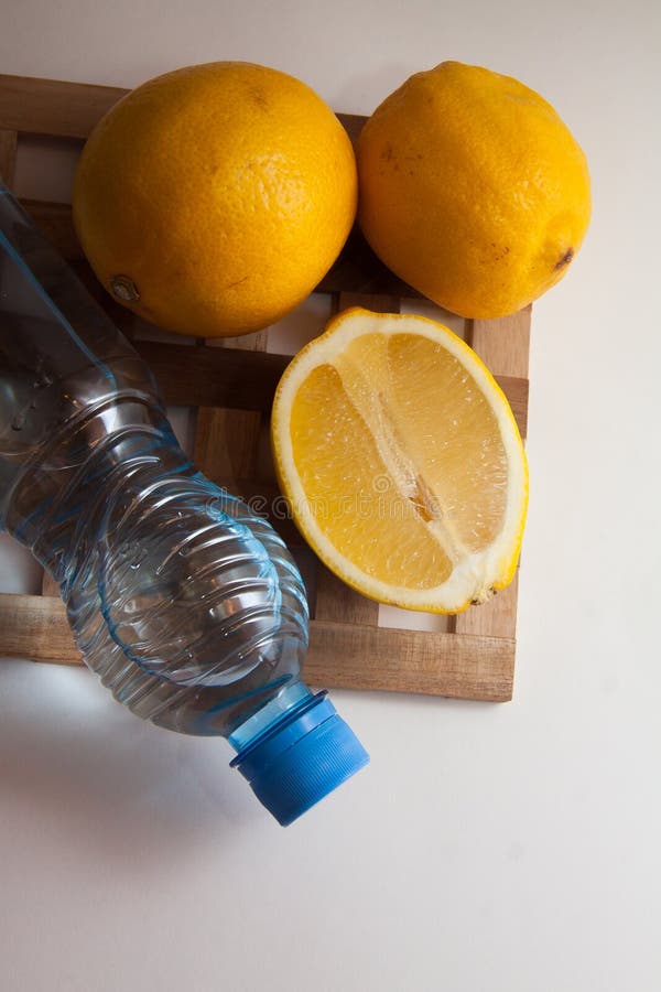 Water bottle and lemons stock photo. Image of freshness - 65209096