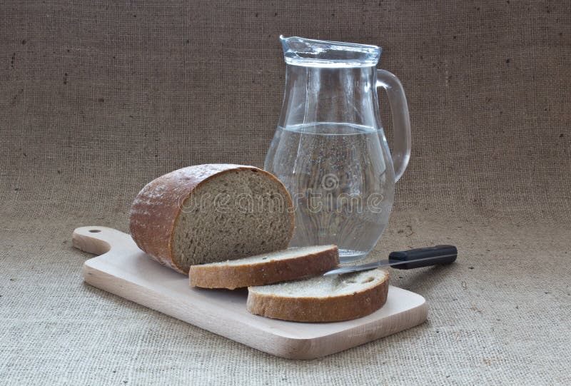 Water and bread stock image. Image of poverty, bread - 23328873