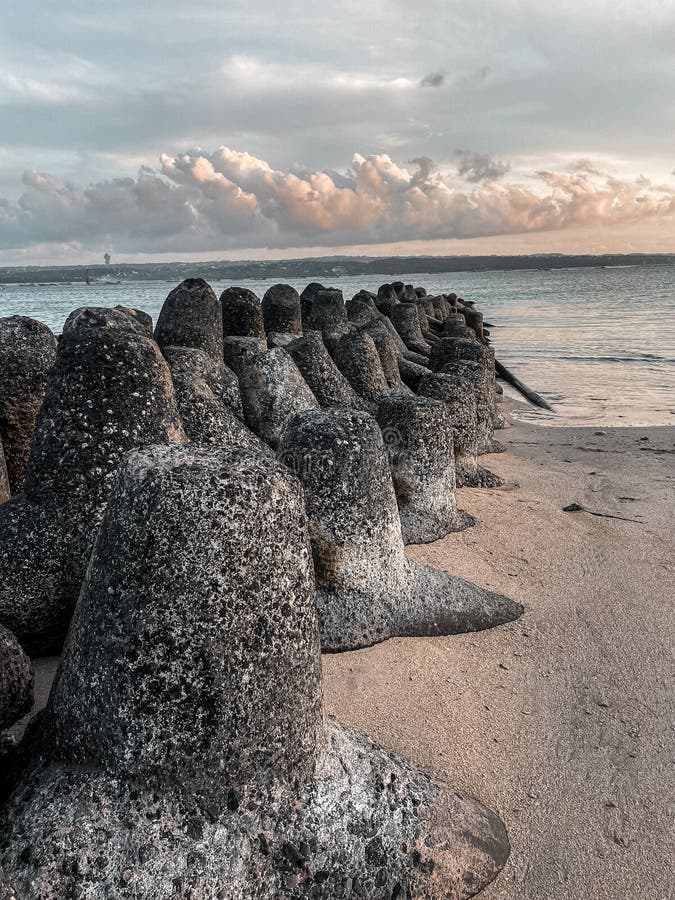 Water Breaker Stone on Sunny Day at Jimbaran Beach Stock Photo - Image ...