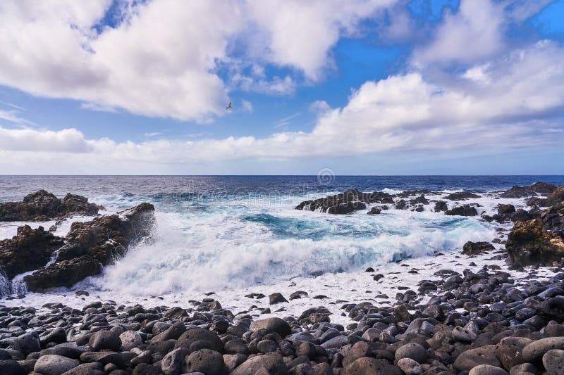 Water Breaks on Pebbles and Rocks on an Empty Beach in the Atlantic ...