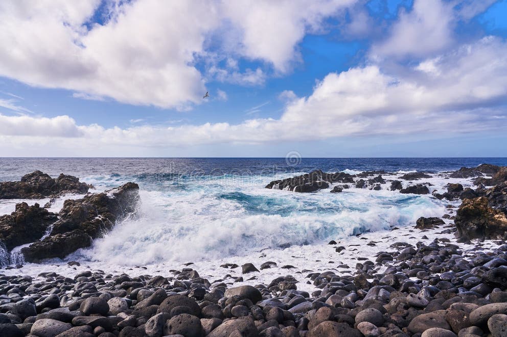Water Breaks on Pebbles and Rocks on an Empty Beach in the Atlantic ...