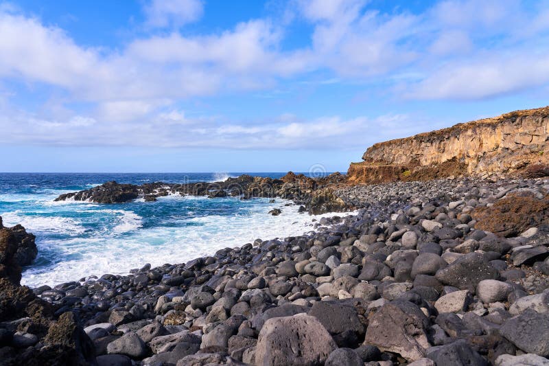 Water Breaks on Pebbles and Rocks on an Empty Beach in the Atlantic ...
