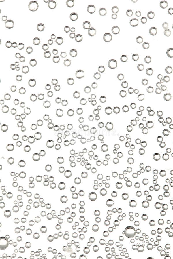 Water Bubbles in a Glass Container on White Background. Close Up Stock ...