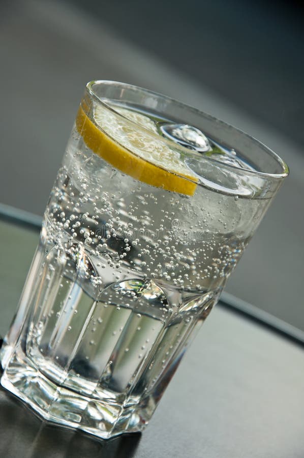 Water bubbles with Lemon stock photo. Image of refreshing - 44361234