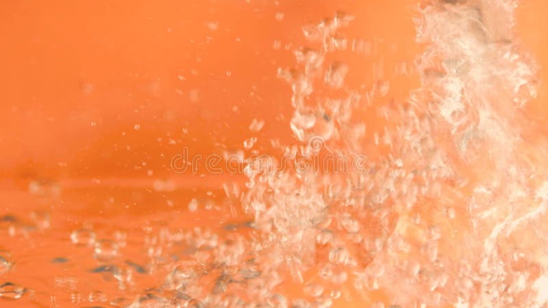 Water Bubbles on Shiny Orange Background Stock Footage - Video of drop ...