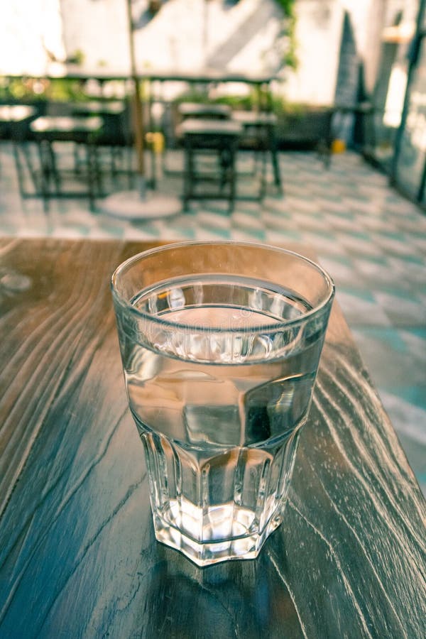 Water on a cafe table stock photo. Image of indoor, cool - 202843310