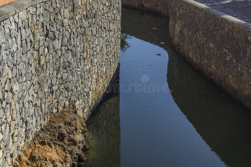Water Canal of Stone Construction Stock Image - Image of leading ...