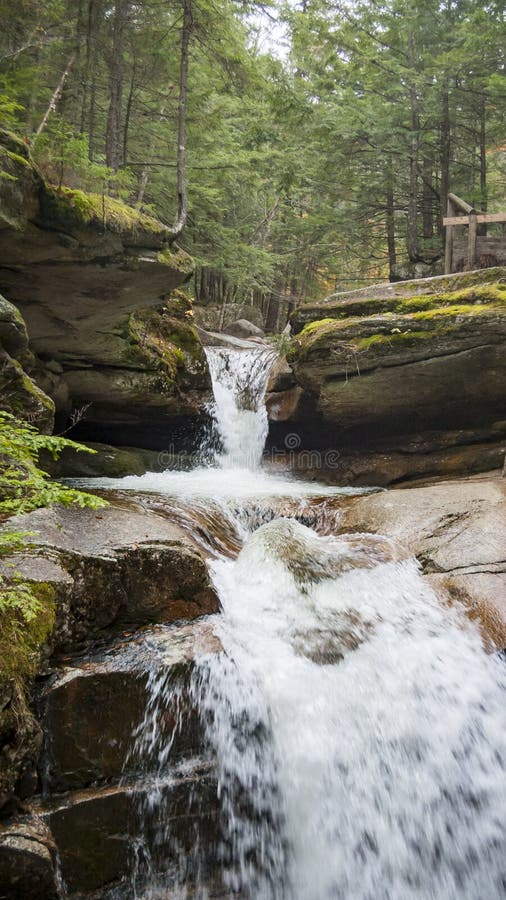 Water Cascading Down Rocky Hillside Stock Image - Image of tree ...