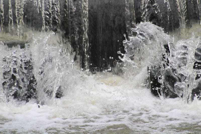 Water Cascading Over the Edge Stock Photo - Image of torrant, splashes ...