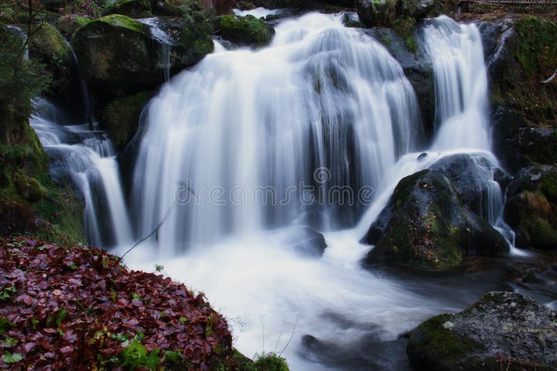 Water Cascading Over a Hill into a Basin Stock Image - Image of river ...