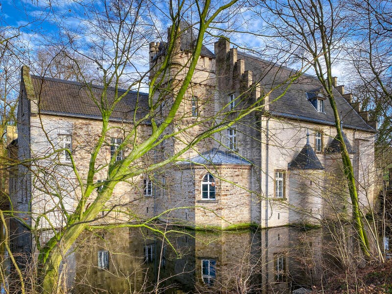 Old Water Castle with Trees and Reflections in Water Stock Photo ...