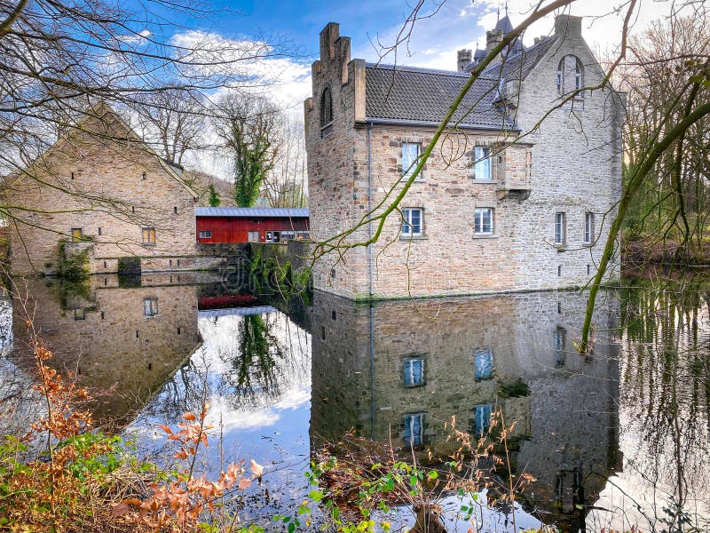 Old Water Castle with Trees and Reflections in Water Stock Photo ...