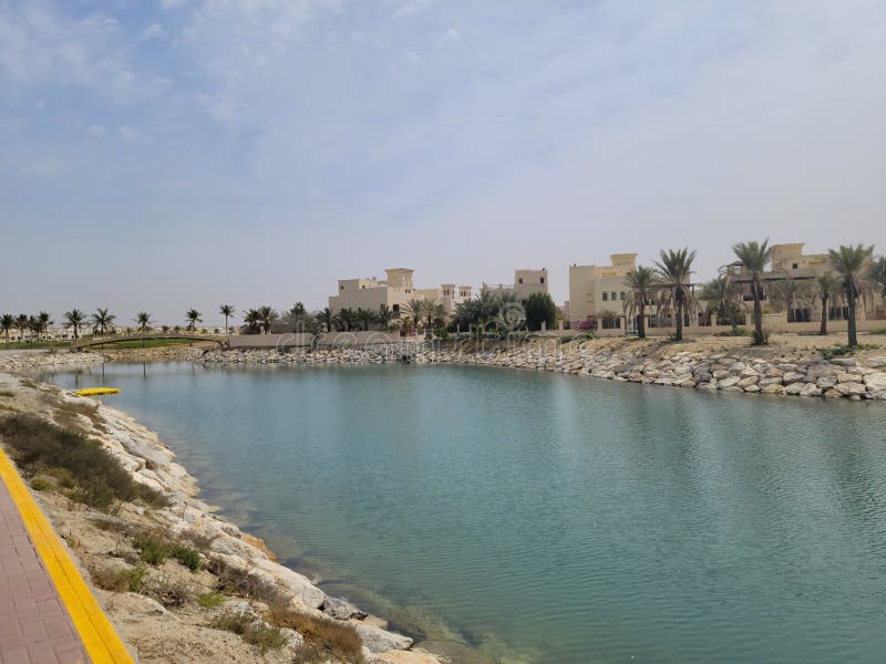Water Channel with Emerald Water Extending Under the Bridge Stock Image ...