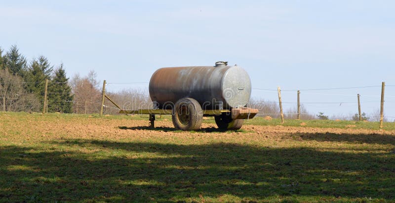Water cistern of a farm stock photo. Image of wheel, farm - 56701568