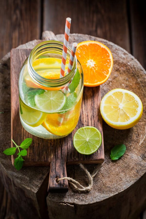 Water with Citrus Fruits and Mint Leaves Stock Image - Image of ...