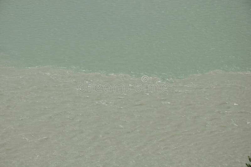 Merging of Two Different Rivers. Stock Image - Image of river, nature ...