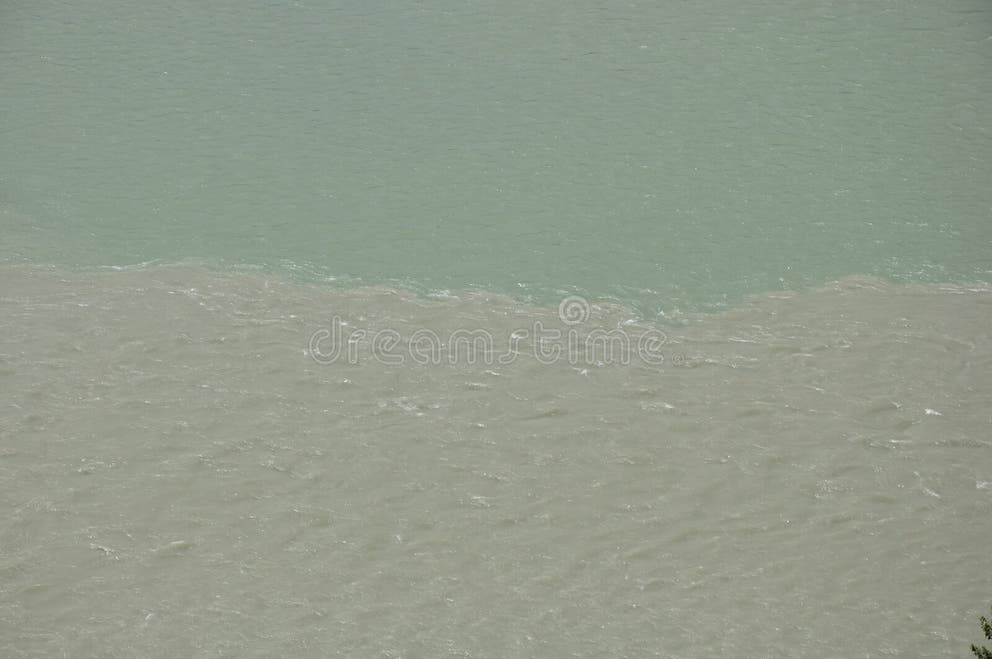 Merging of Two Different Rivers. Stock Image - Image of river, nature ...