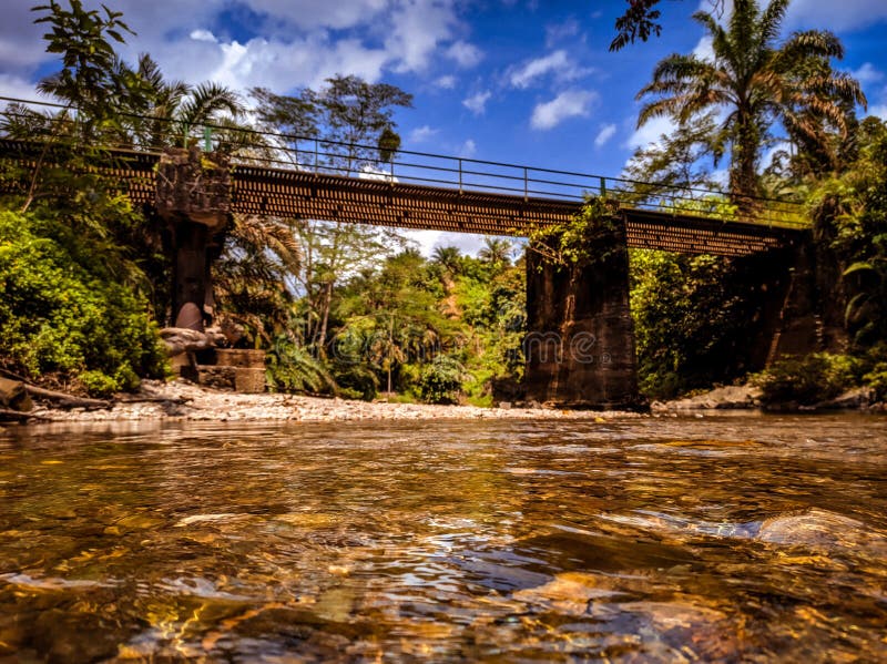 Clear Water Under the Iron Bridge Stock Photo - Image of clear, rocks ...